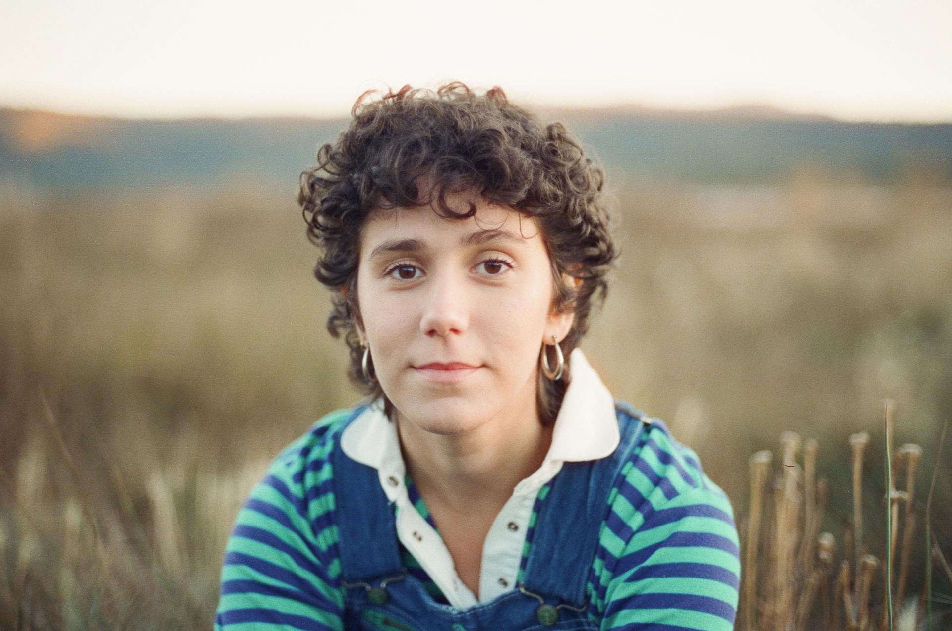 Queer singer-songwriter Olive Klug signs with Nettwerk + shares "Out of ...